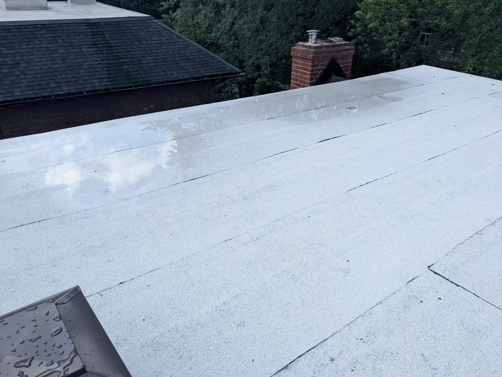 water pooling on a new flat roof - RedFlagDeals.com Forums