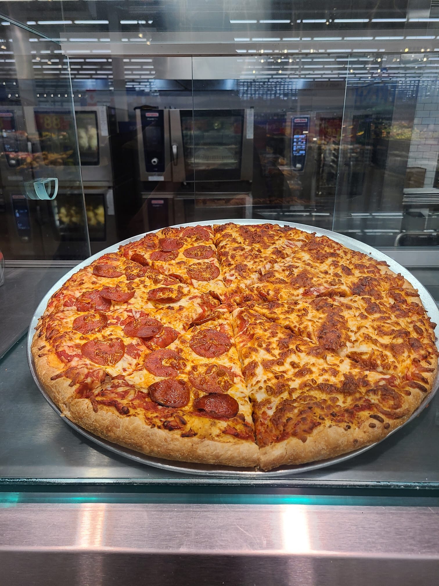 [Walmart] Walmart fresh baked-to-order pizza Whole $12.97, Slice $2.57 ...